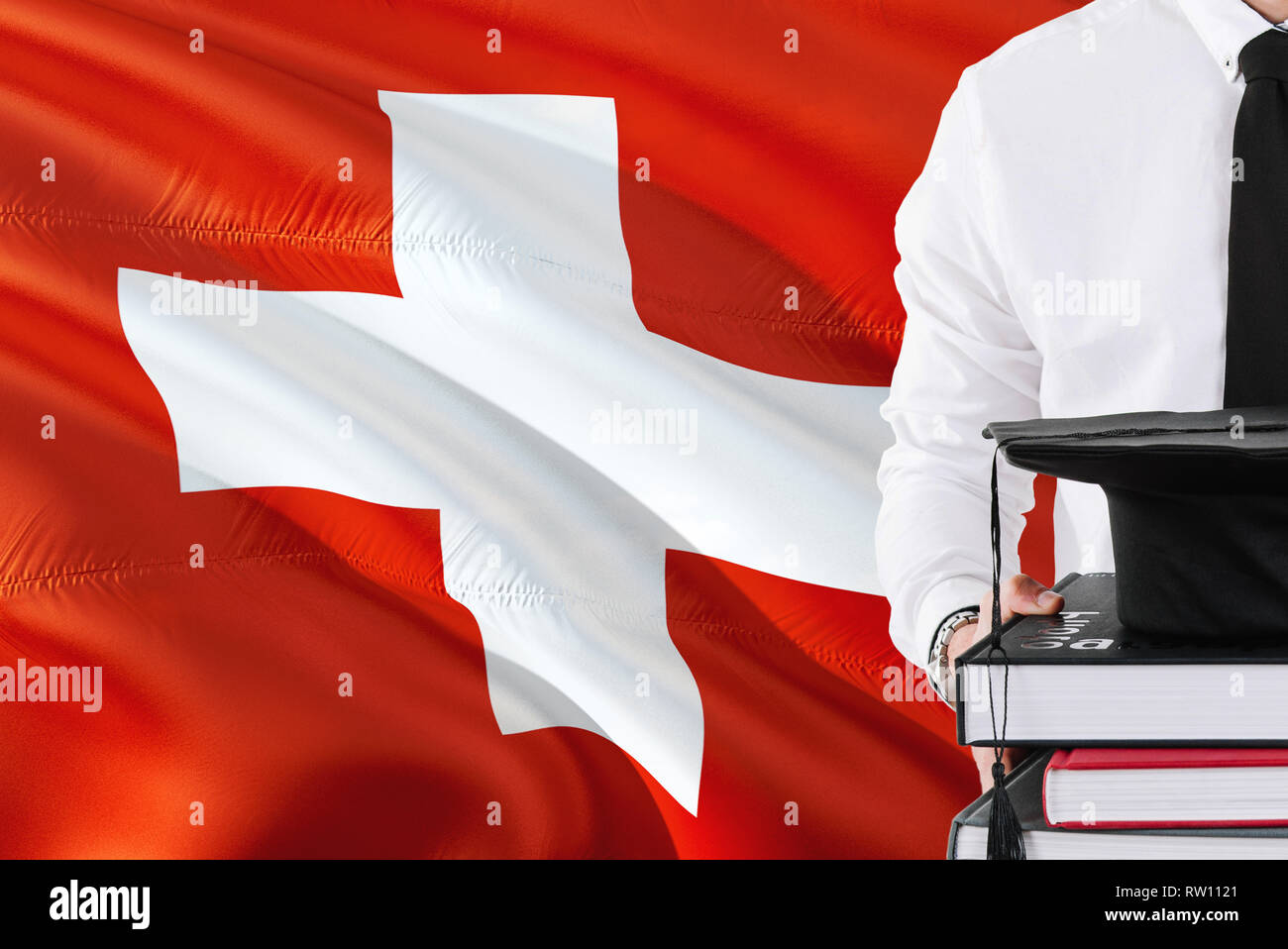 Successful Swiss student education concept. Holding books and ...