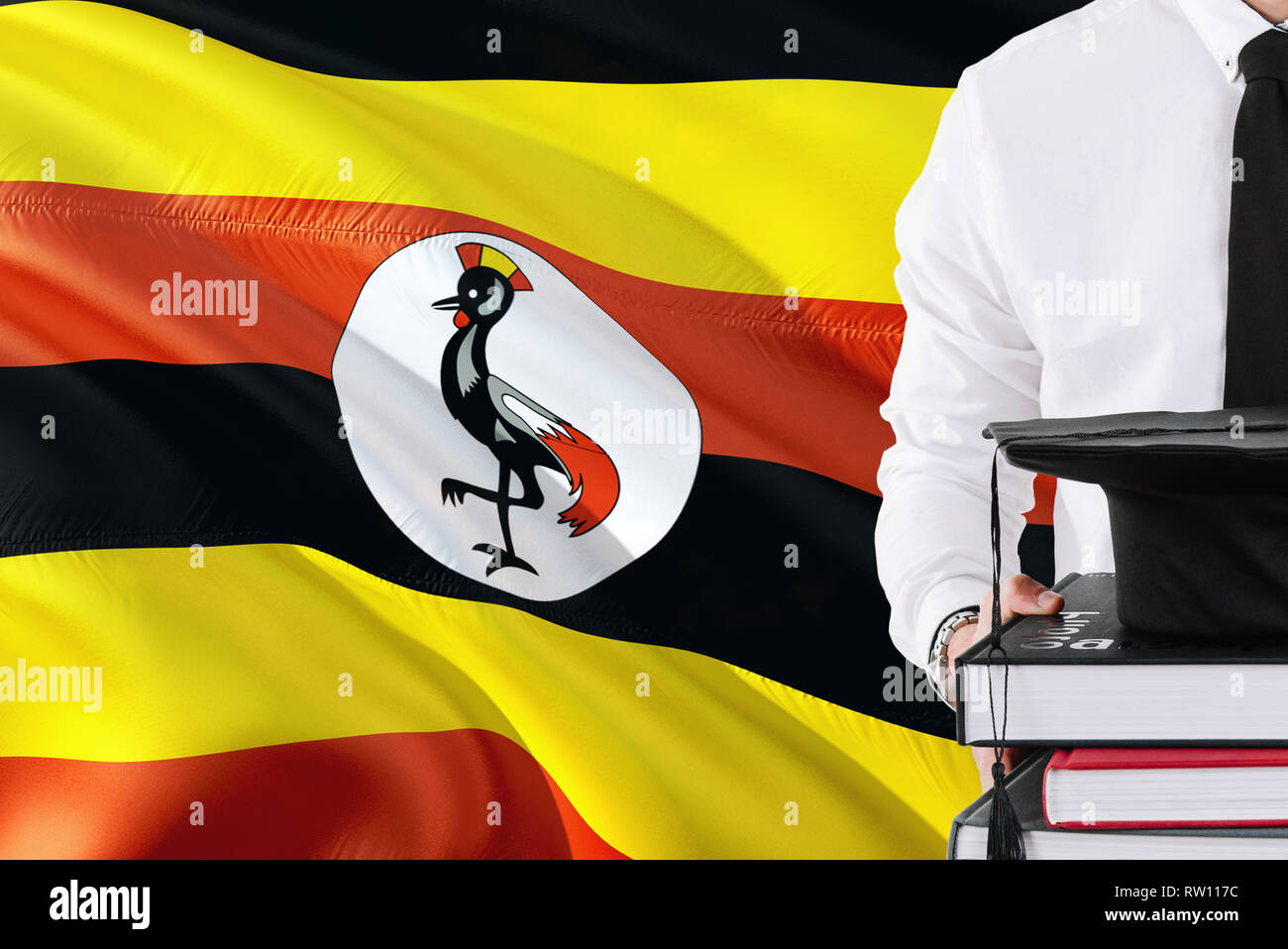 Successful Ugandan student education concept. Holding books and ...