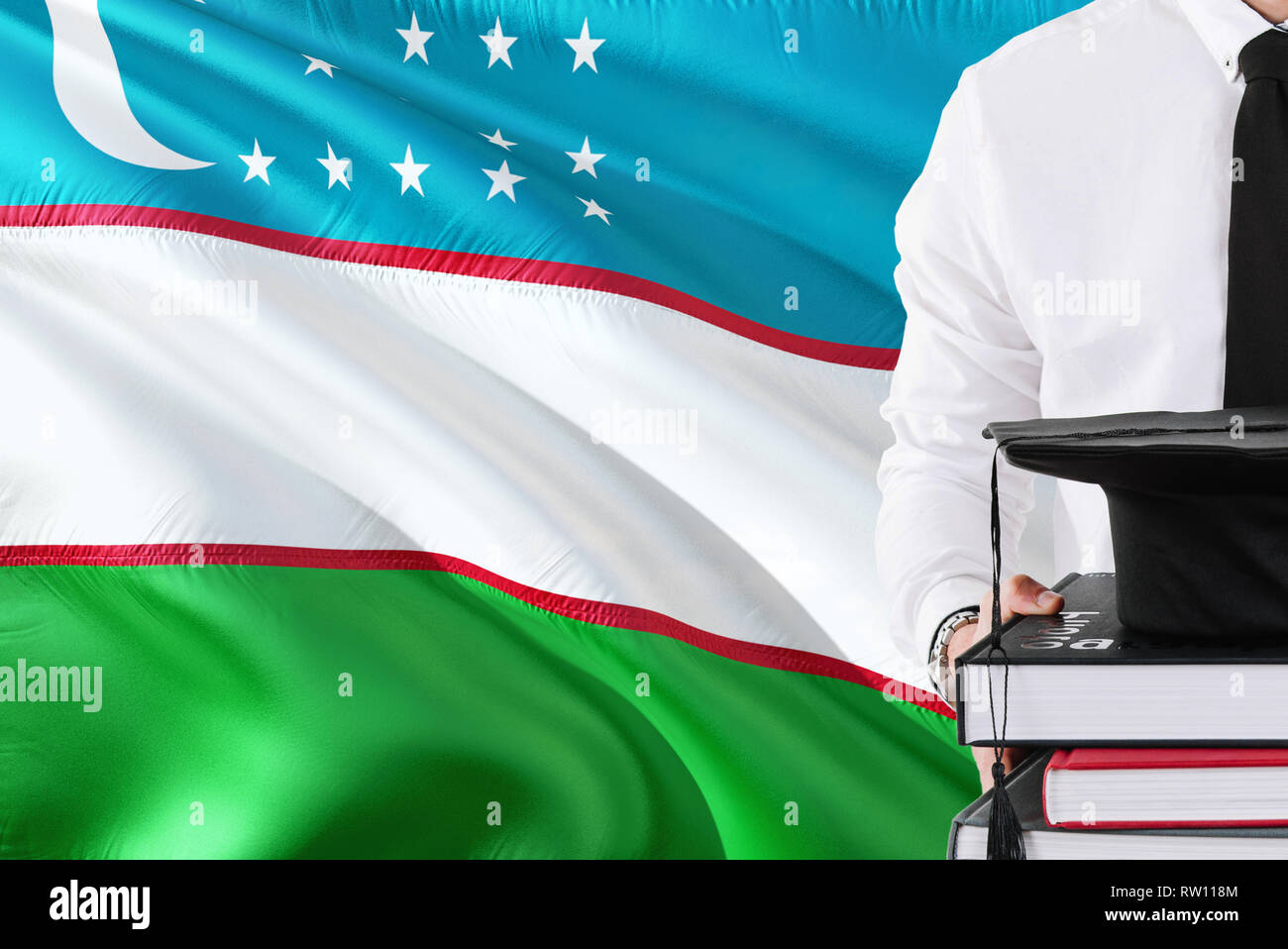 Successful Uzbek student education concept. Holding books and ...