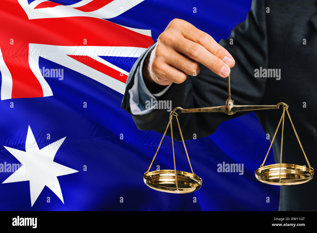 Australian Judge is holding golden scales of justice with Australia ...