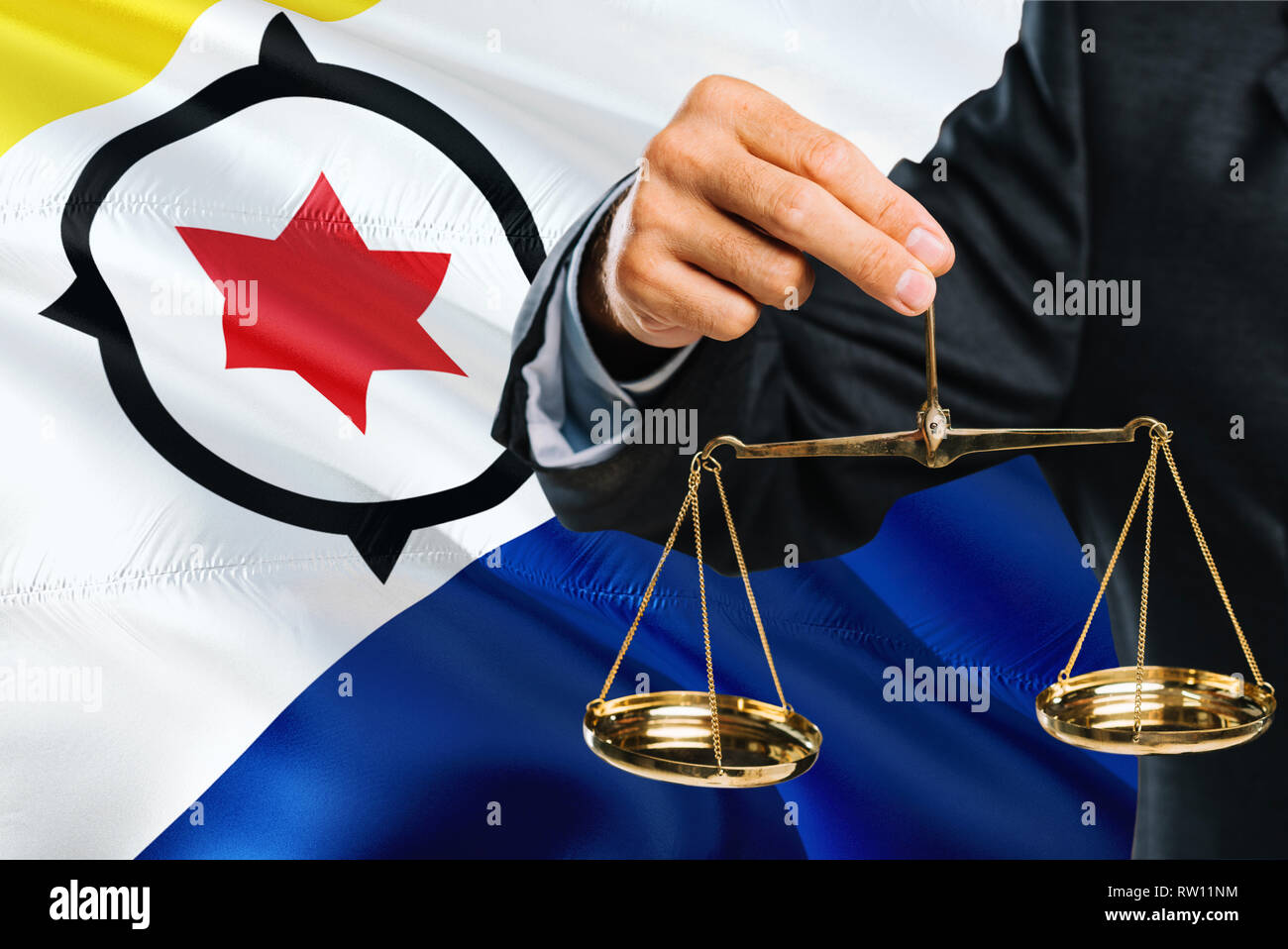 Judge Is Holding Golden Scales Of Justice With Bonaire Waving Flag