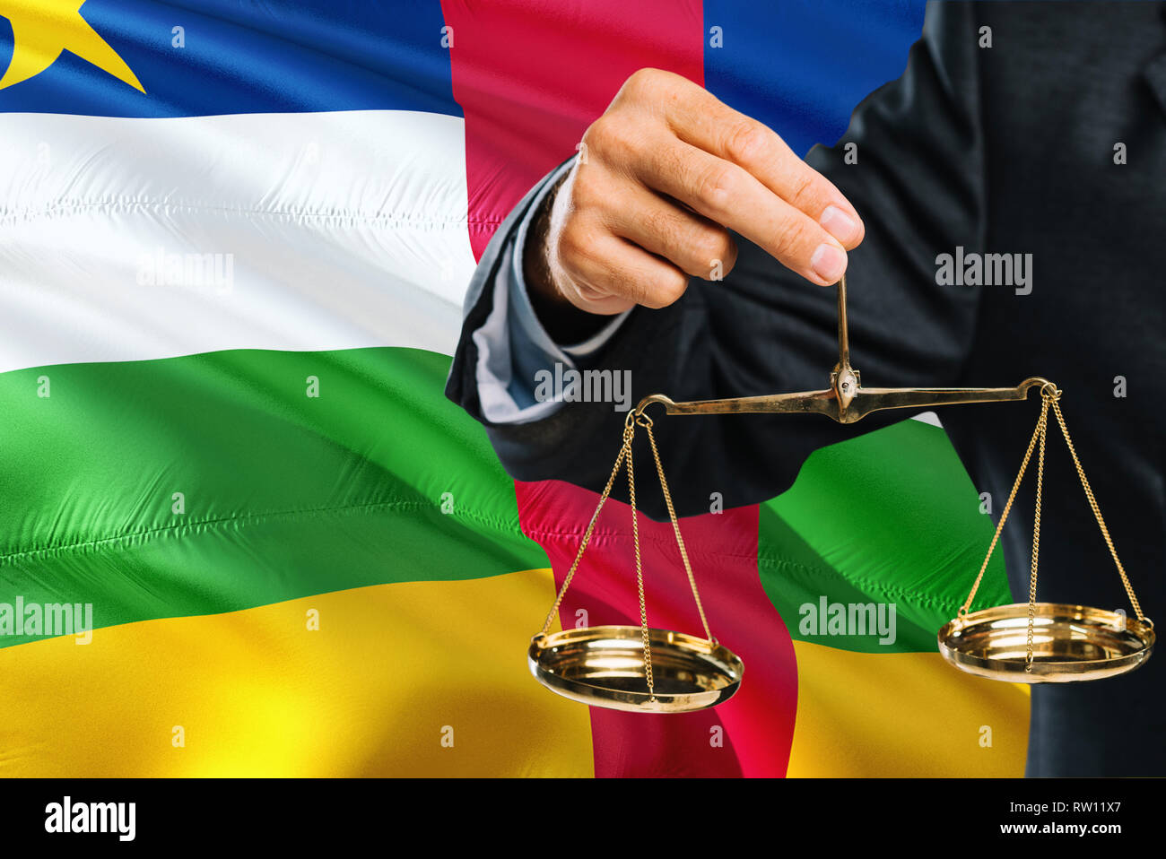 Judge is holding golden scales of justice with Central African Republic ...