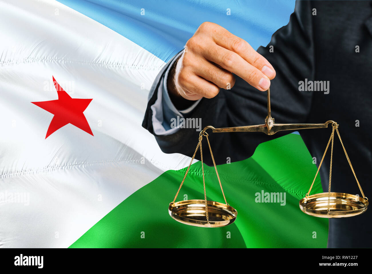 Judge Is Holding Golden Scales Of Justice With Djibouti Waving Flag