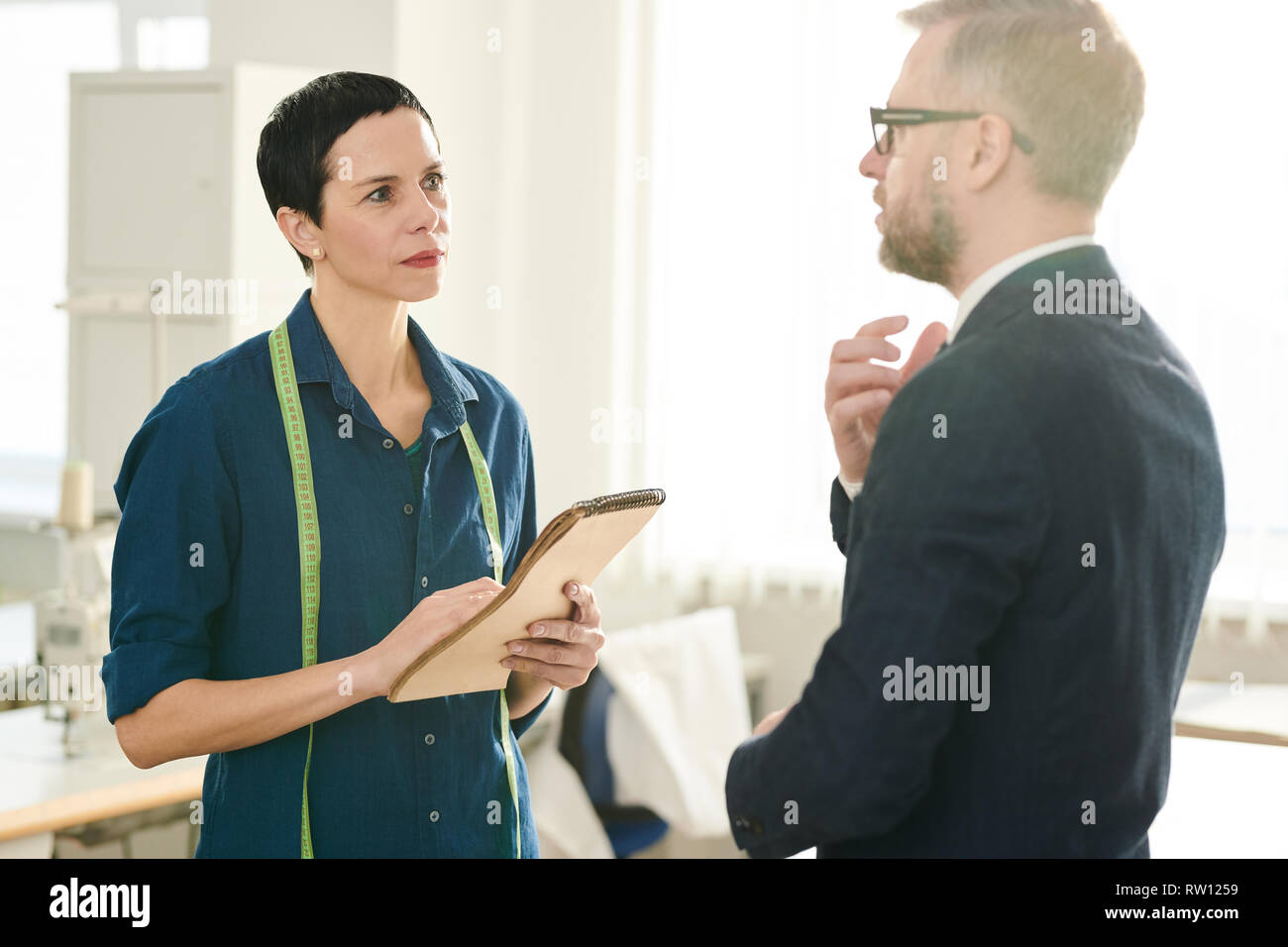 Conversation with client Stock Photo - Alamy