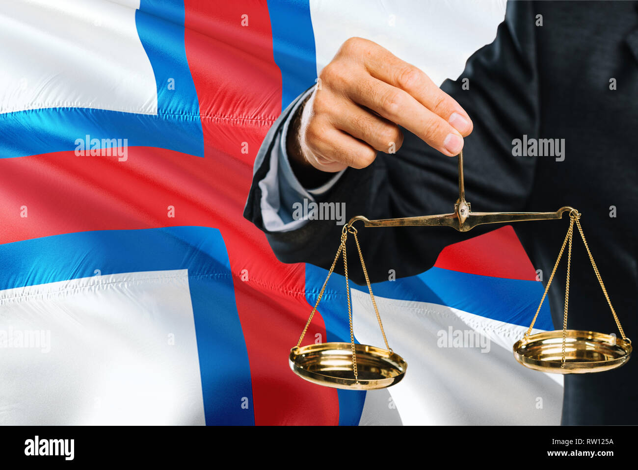 Judge Is Holding Golden Scales Of Justice With Faroe Islands Waving