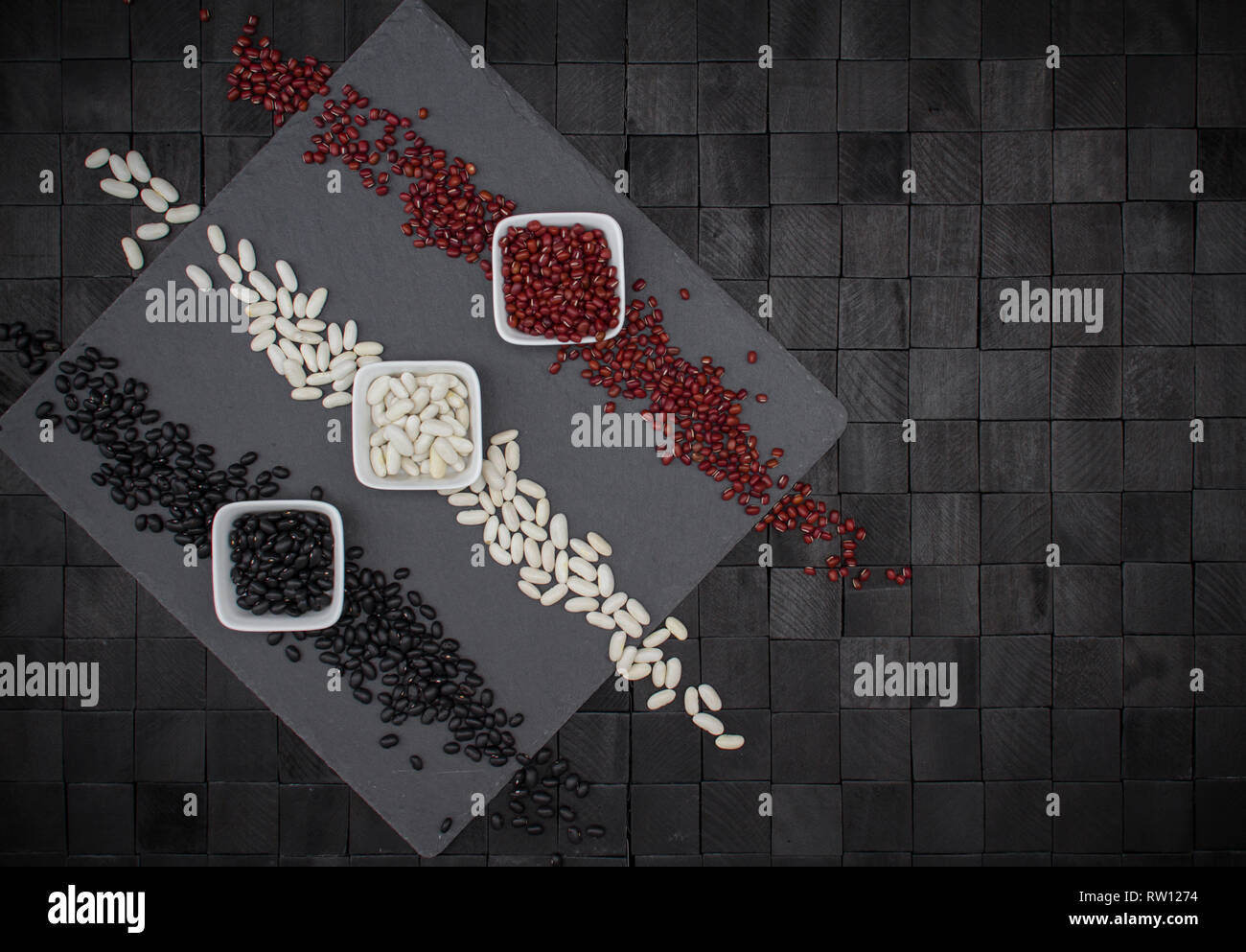 Background design composition from above with square slate plate and ...