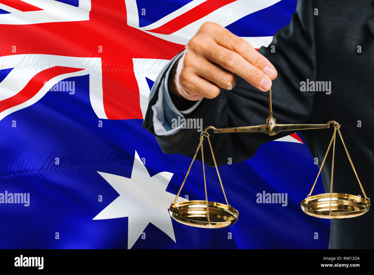 Judge Is Holding Golden Scales Of Justice With Heard Island And