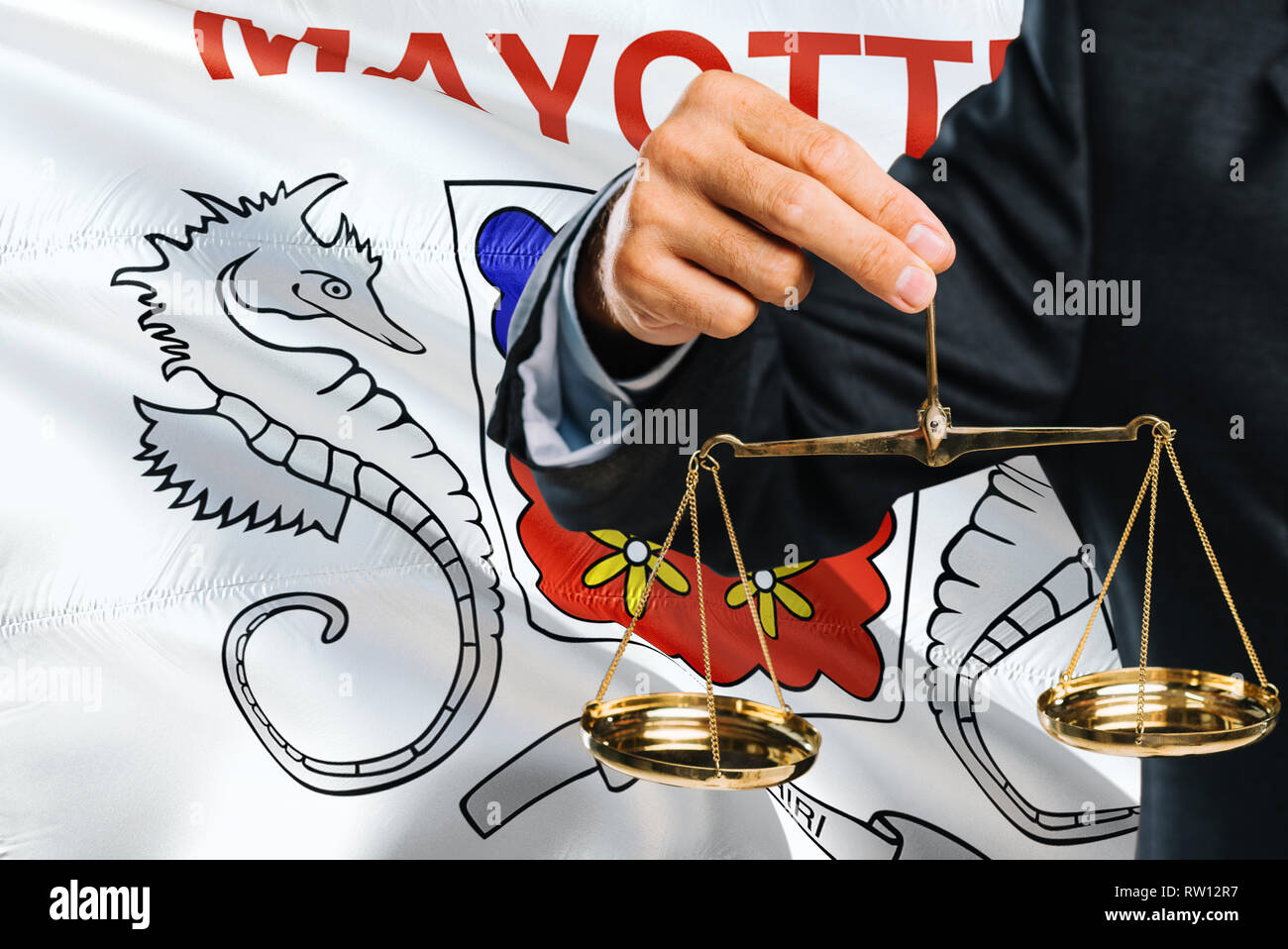 Judge Is Holding Golden Scales Of Justice With Mayotte Waving Flag
