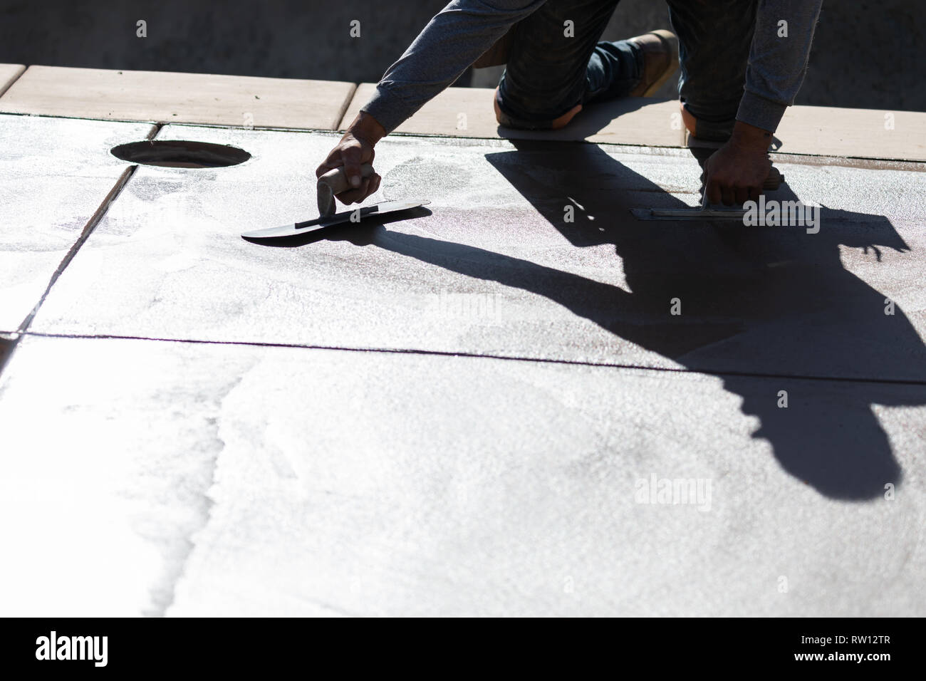 Construction Worker Smoothing Wet Cement With Trowel Tools Stock Photo ...