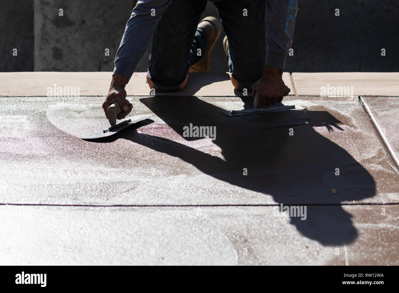 Construction Worker Smoothing Wet Cement With Trowel Tools Stock Photo ...