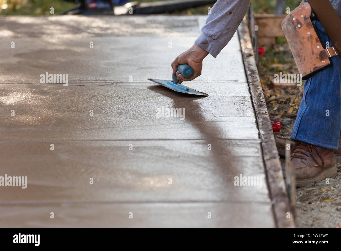 Construction Worker Smoothing Wet Cement With Trowel Tools Stock Photo ...