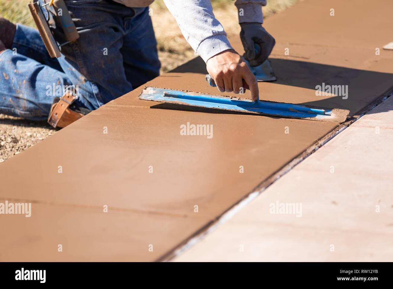 Construction Worker Smoothing Wet Cement With Trowel Tools Stock Photo ...