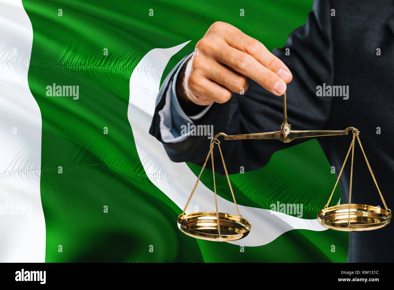 Pakistani Judge is holding golden scales of justice with Pakistan ...