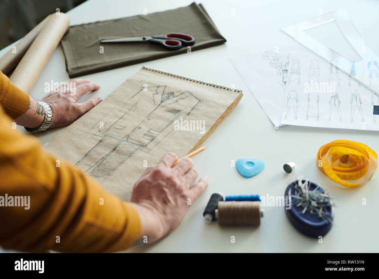 Fashion sketch in notepad Stock Photo - Alamy