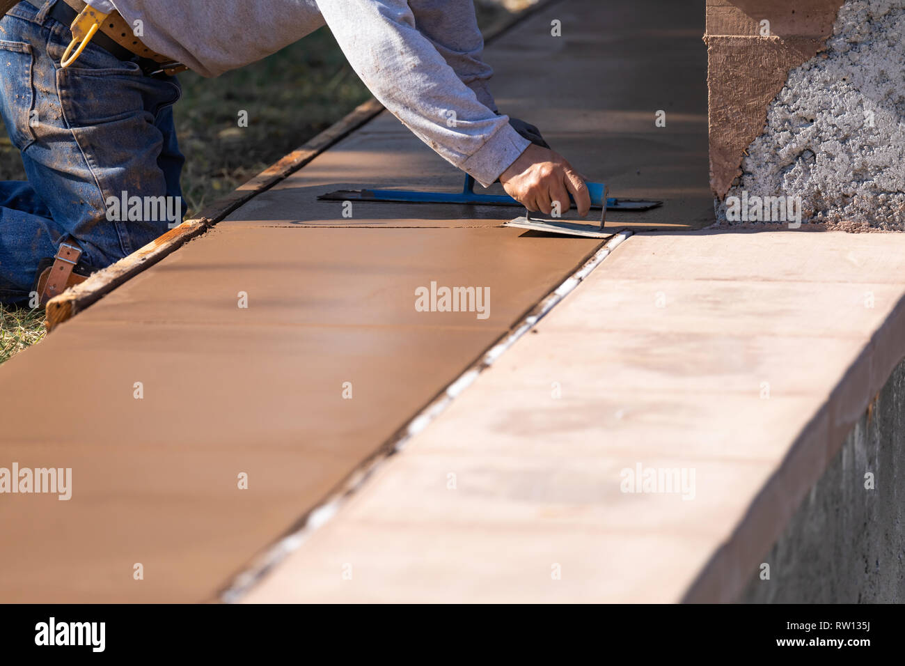 Construction Worker Smoothing Wet Cement With Hand Edger Tool Stock ...