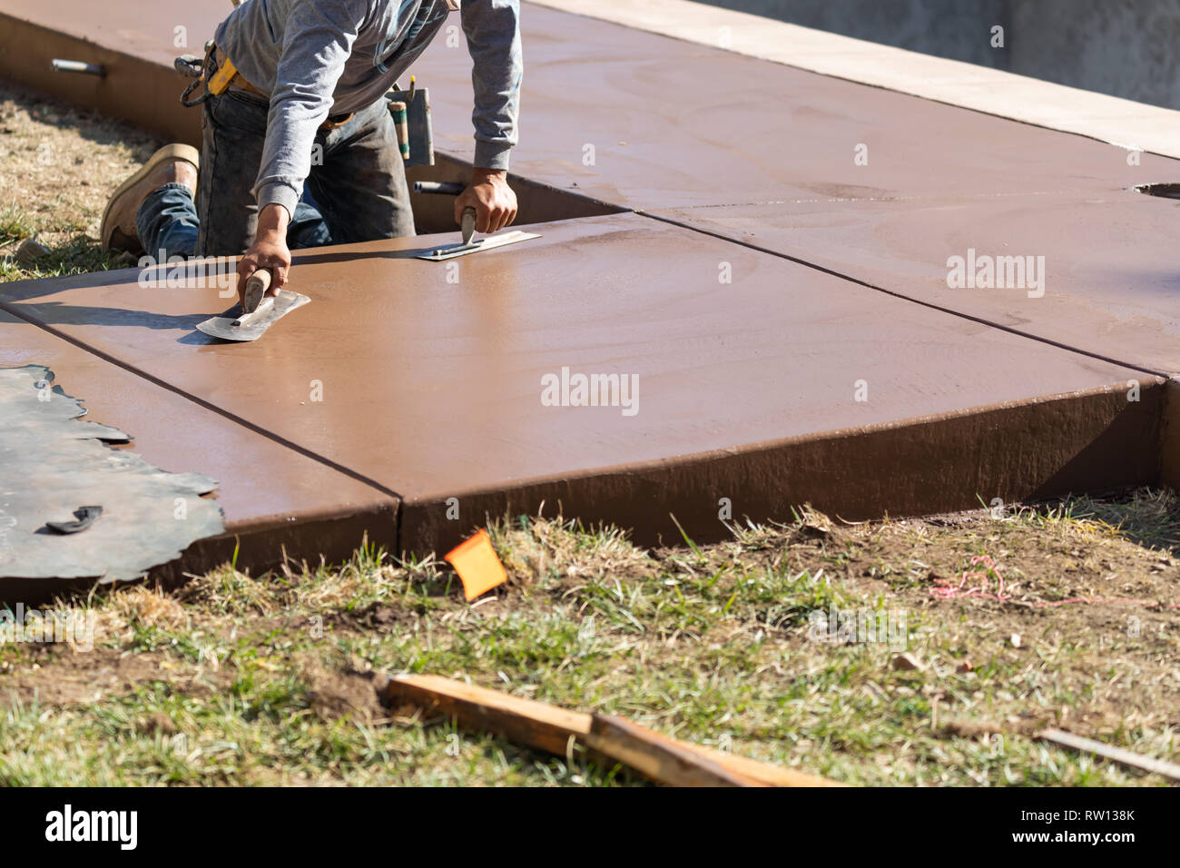 Construction Worker Smoothing Wet Cement With Trowel Tools Stock Photo ...