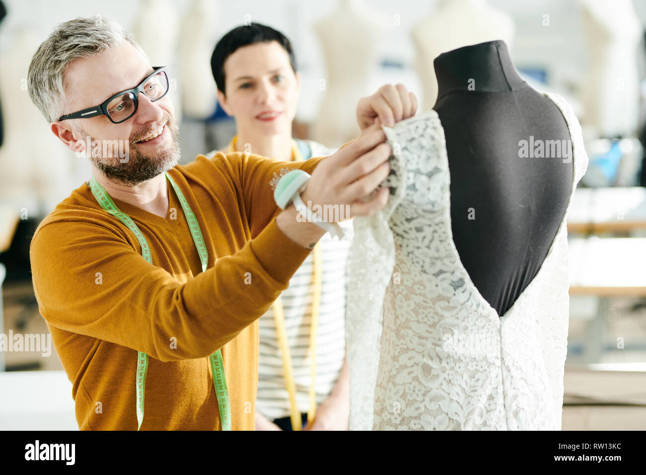 Man pinning man hi-res stock photography and images - Alamy