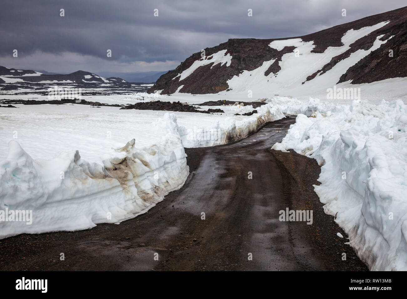 Dirt road through snow from Askja caldera to Dreki campsite, a popular ...