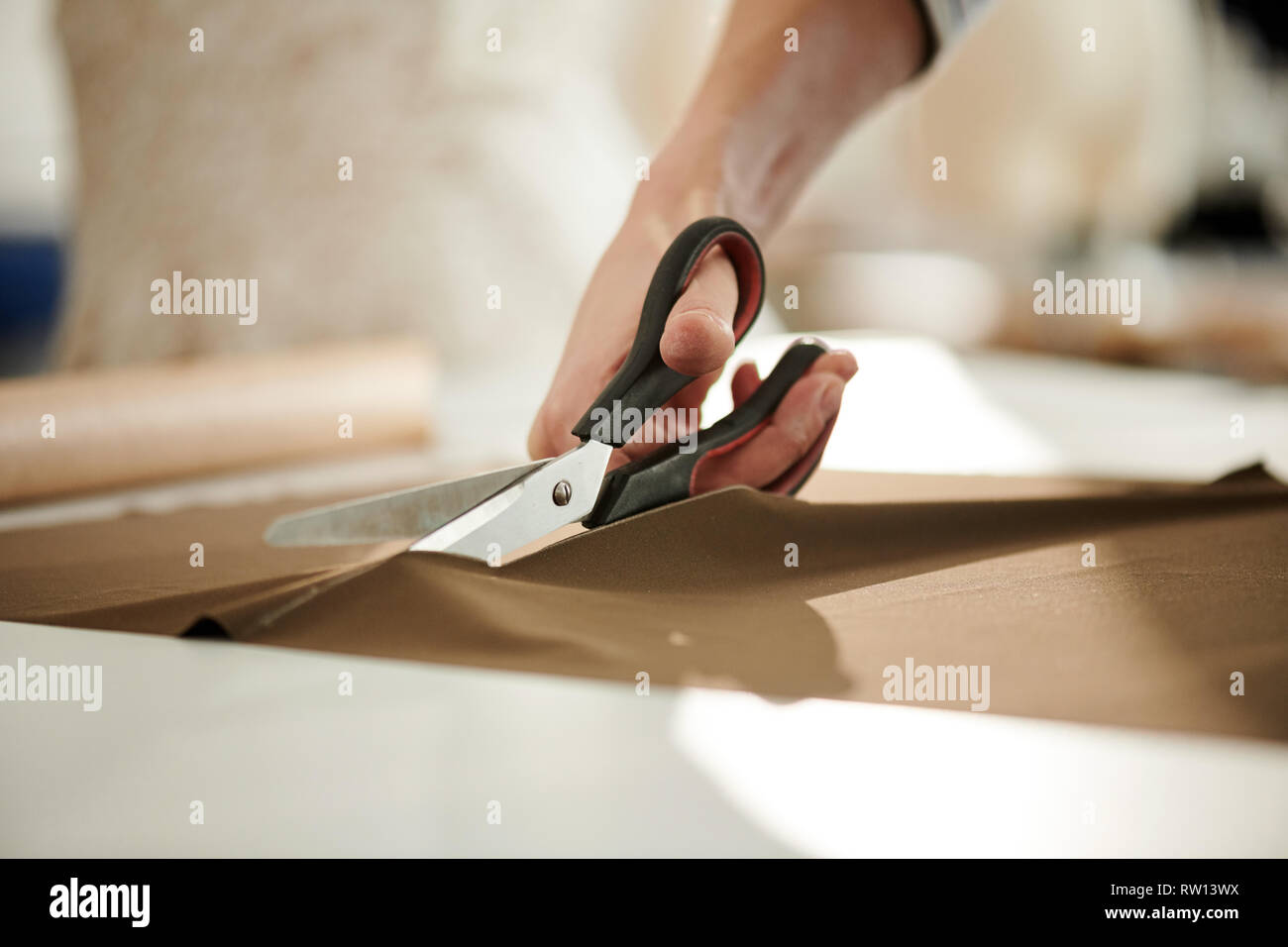 Tailoring cutting craft tailor hi-res stock photography and images - Alamy