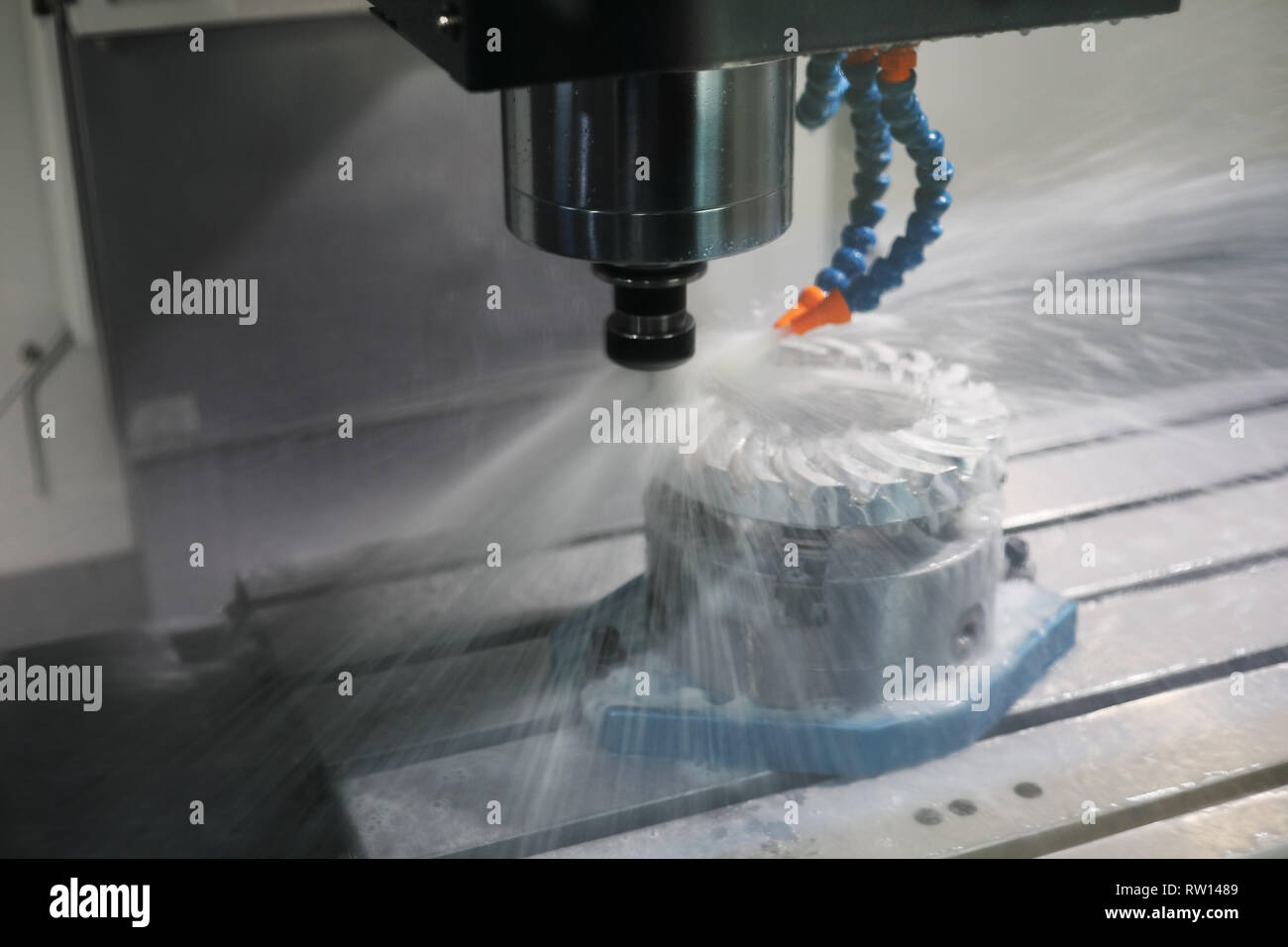 Cnc milling machine cutting oil coolant hi-res stock photography and ...