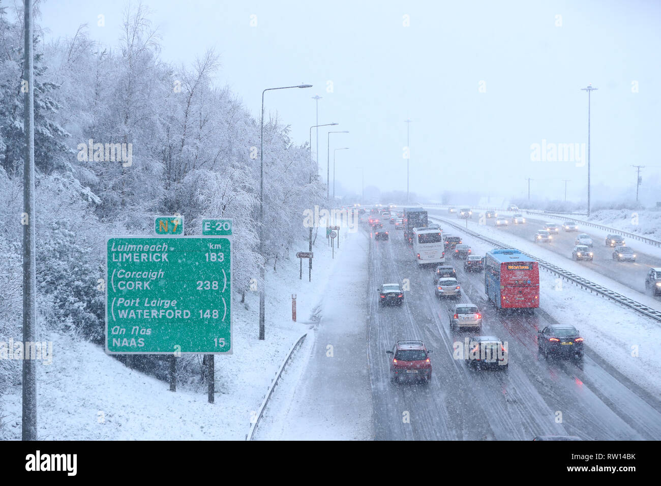 Traffic in snowy conditions on the N7 in Dublin. Snow and sleet has ...