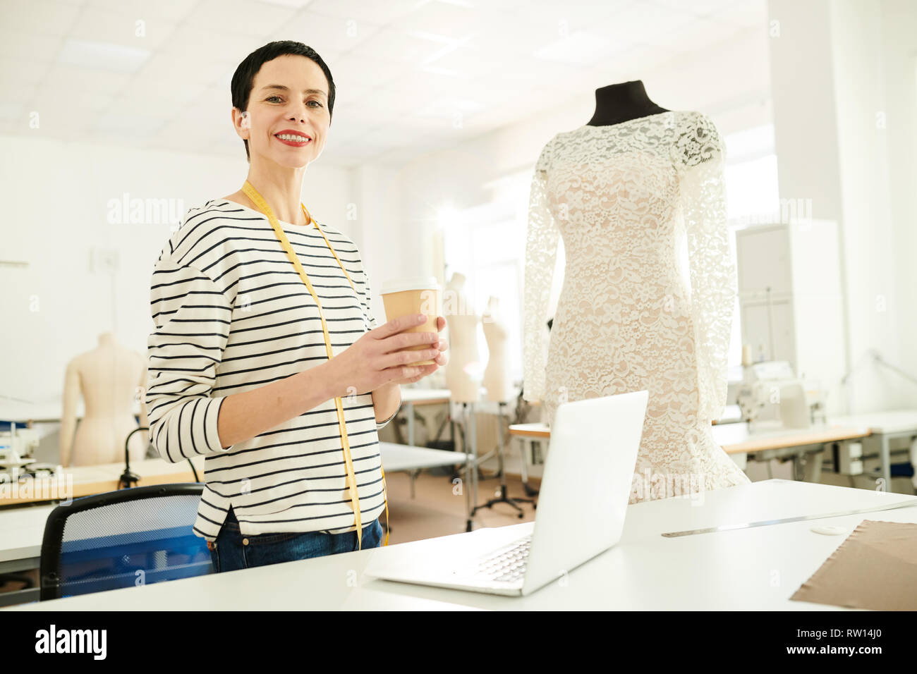 Working in fashion studio Stock Photo - Alamy