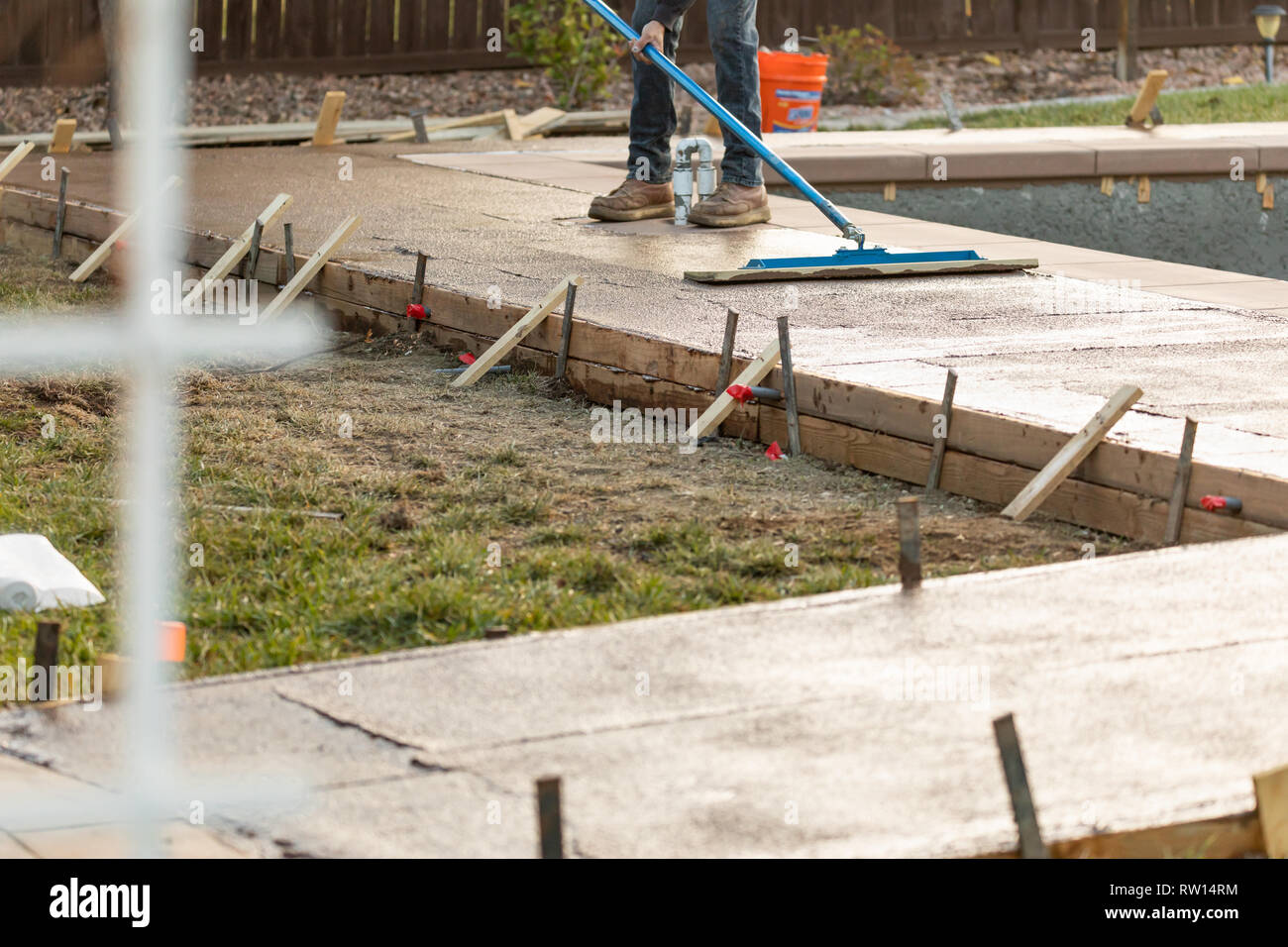 Construction Worker Smoothing Wet Cement With Trowel Tool Stock Photo ...