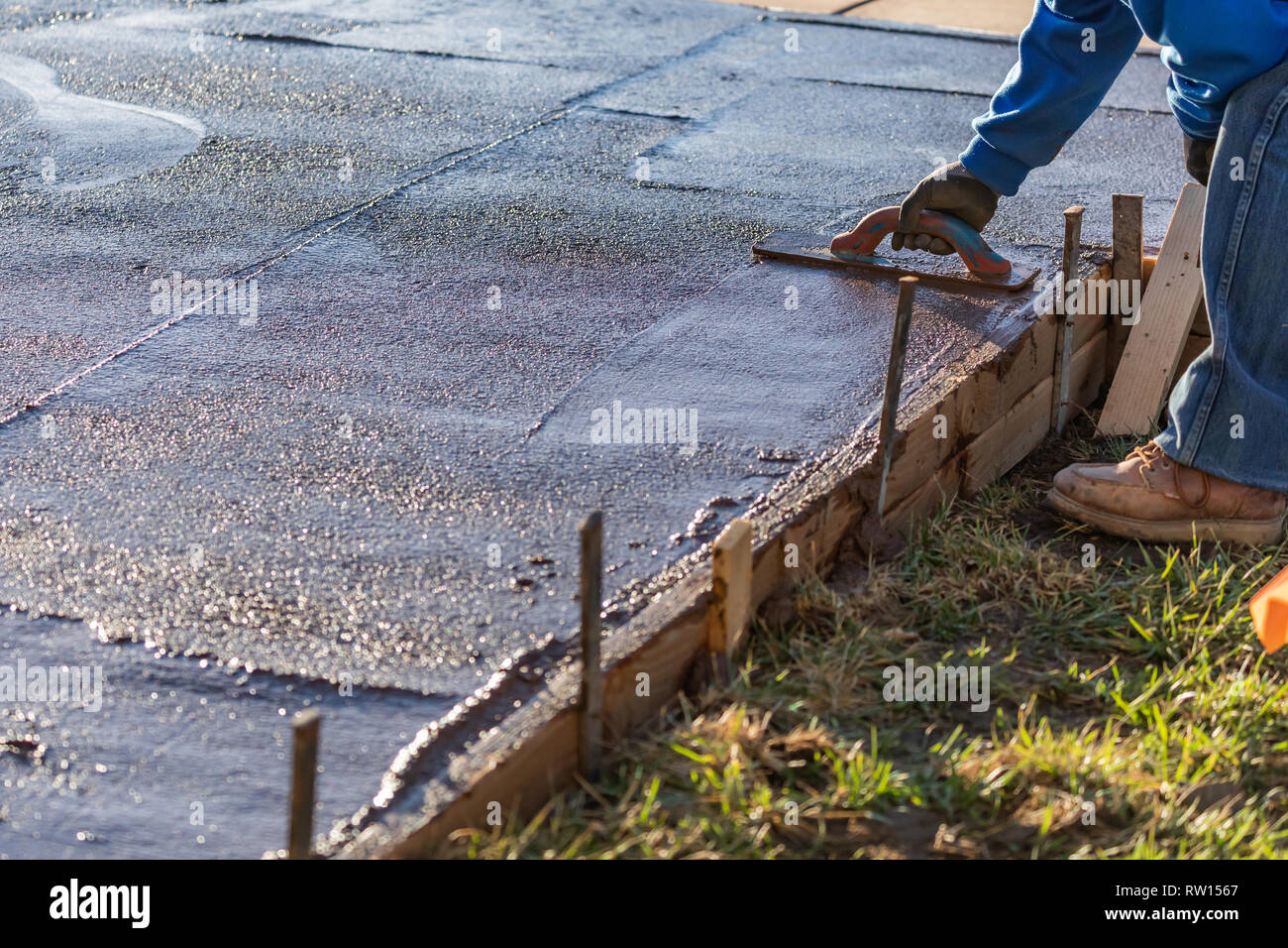 Wood trowel working smooth concrete hi-res stock photography and images ...