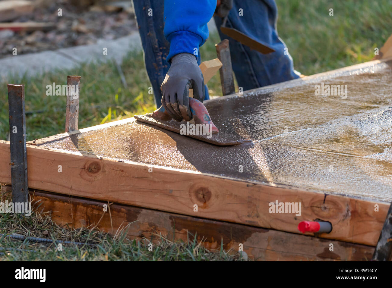 Construction Worker Smoothing Wet Cement With Trowel Tools Stock Photo ...
