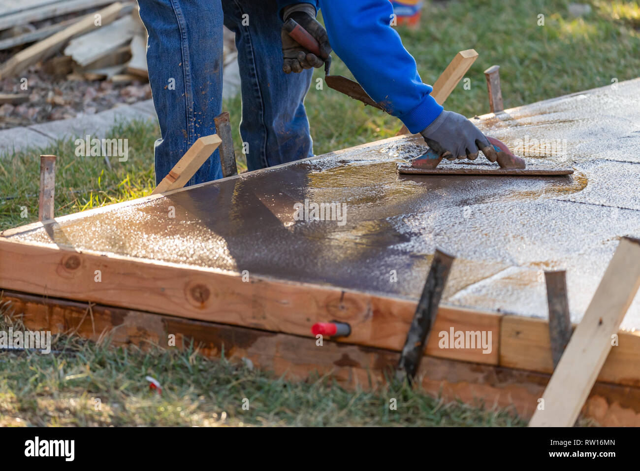 Construction Worker Smoothing Wet Cement With Trowel Tools Stock Photo ...
