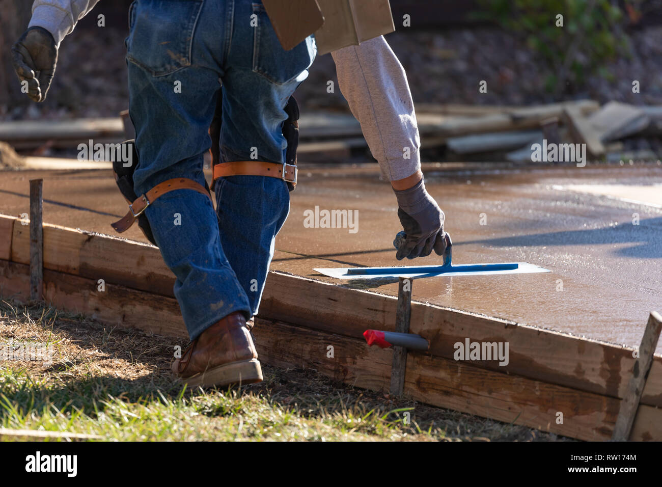 Construction Worker Smoothing Wet Cement With Trowel Tools Stock Photo ...
