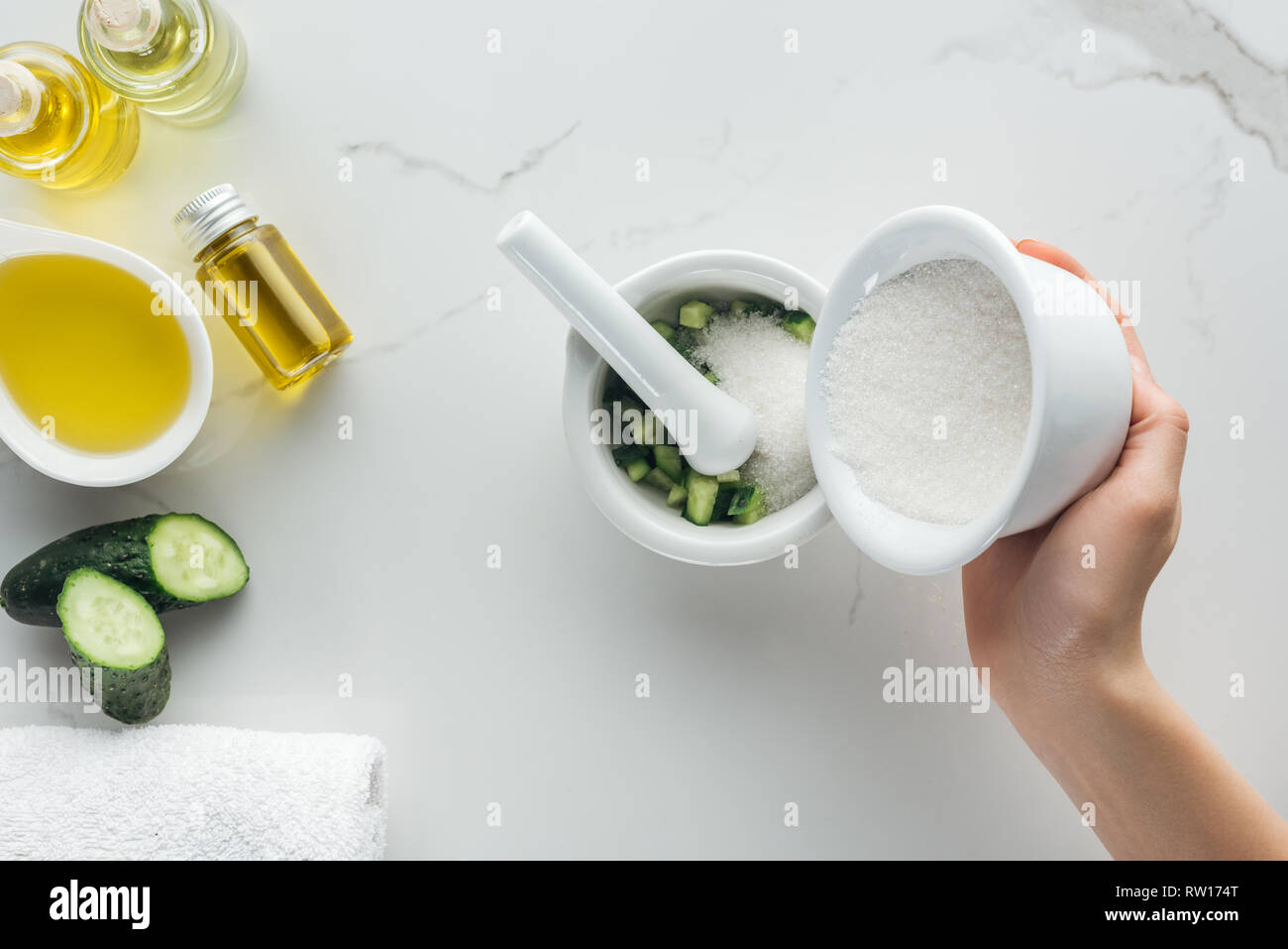 Woman adding salt to food hi-res stock photography and images - Alamy