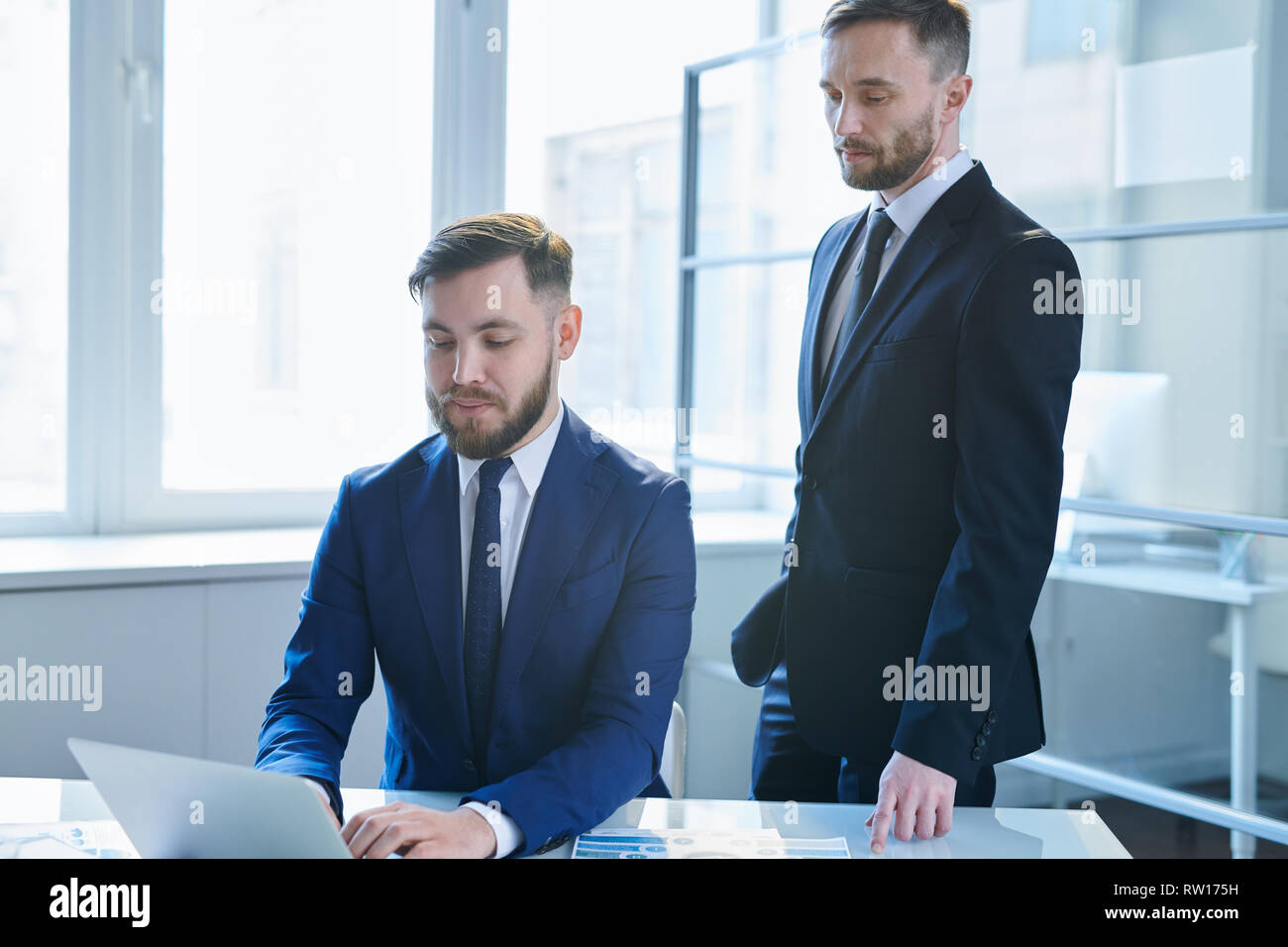 Subordinate and employer Stock Photo - Alamy