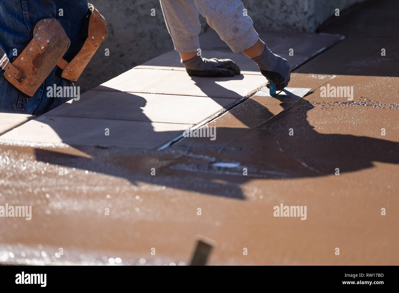 Construction Worker Smoothing Wet Cement With Hand Edger Tool Stock ...