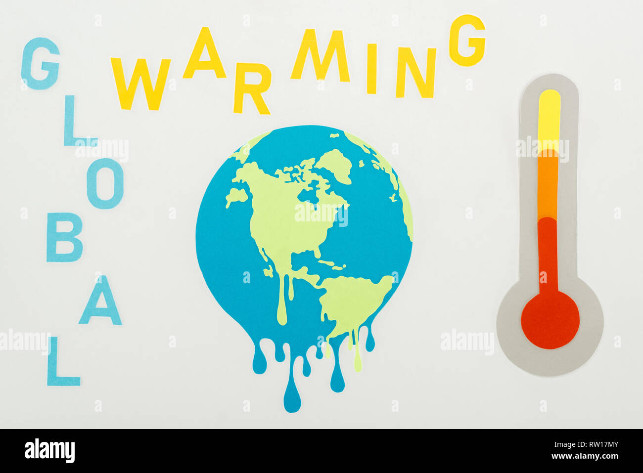 paper cut melting globe, "global warming" lettering, and thermometer on ...