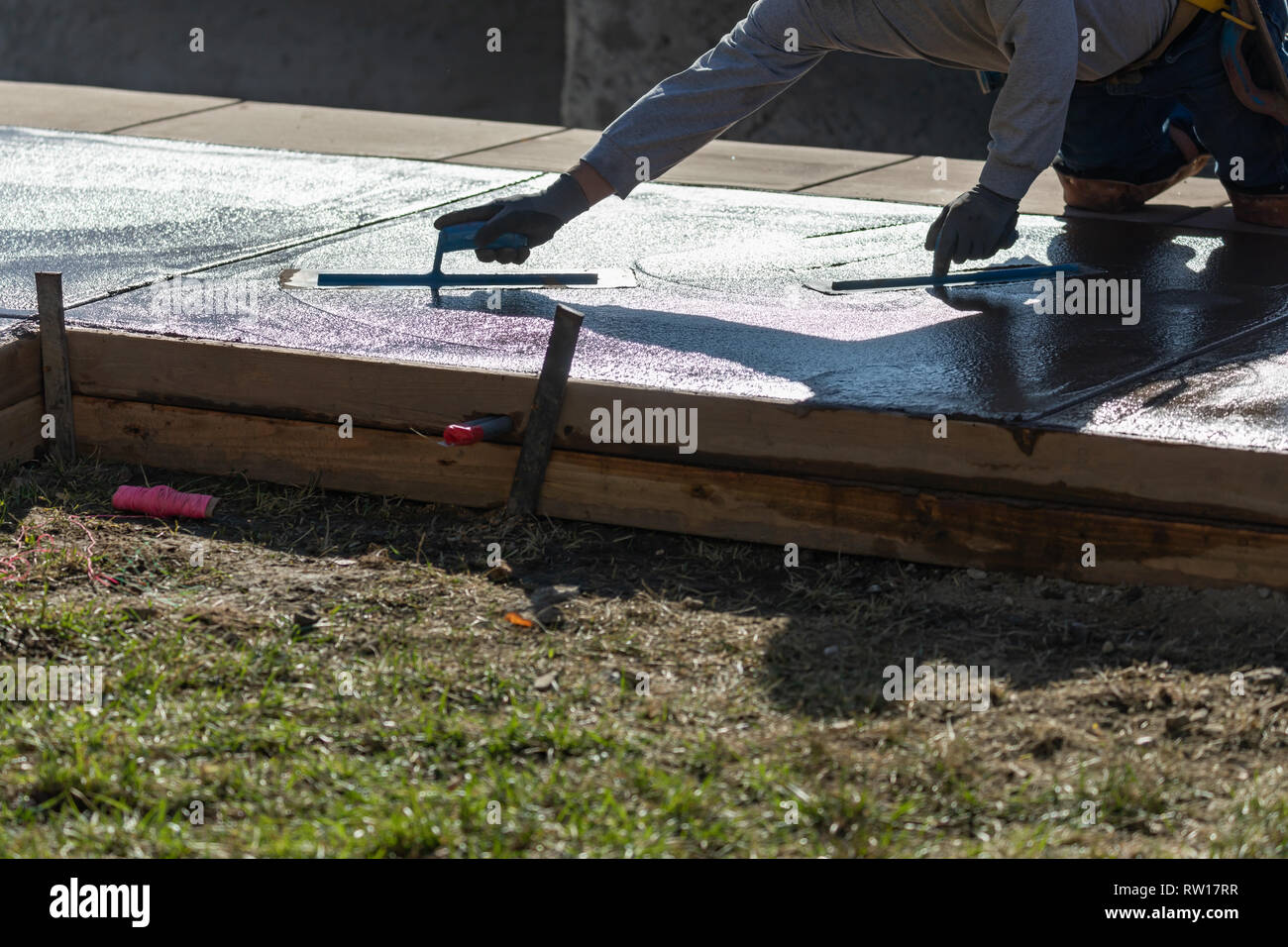 Construction Worker Smoothing Wet Cement With Trowel Tools Stock Photo ...