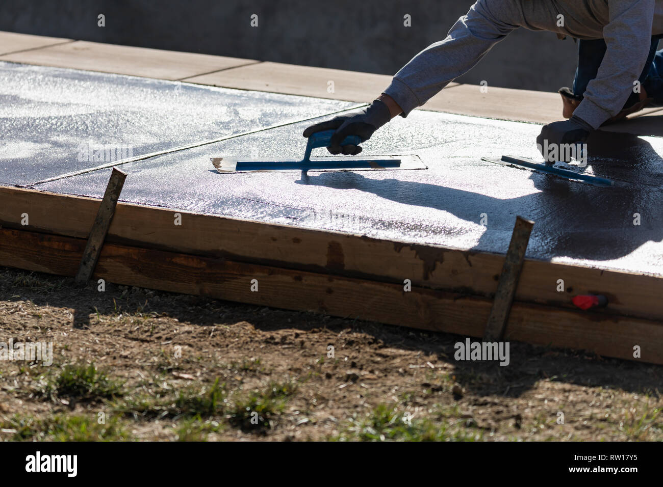 Construction Worker Smoothing Wet Cement With Trowel Tools Stock Photo ...
