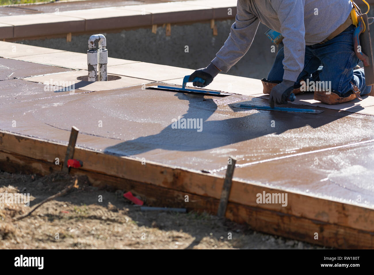 Construction Worker Smoothing Wet Cement With Trowel Tools Stock Photo ...