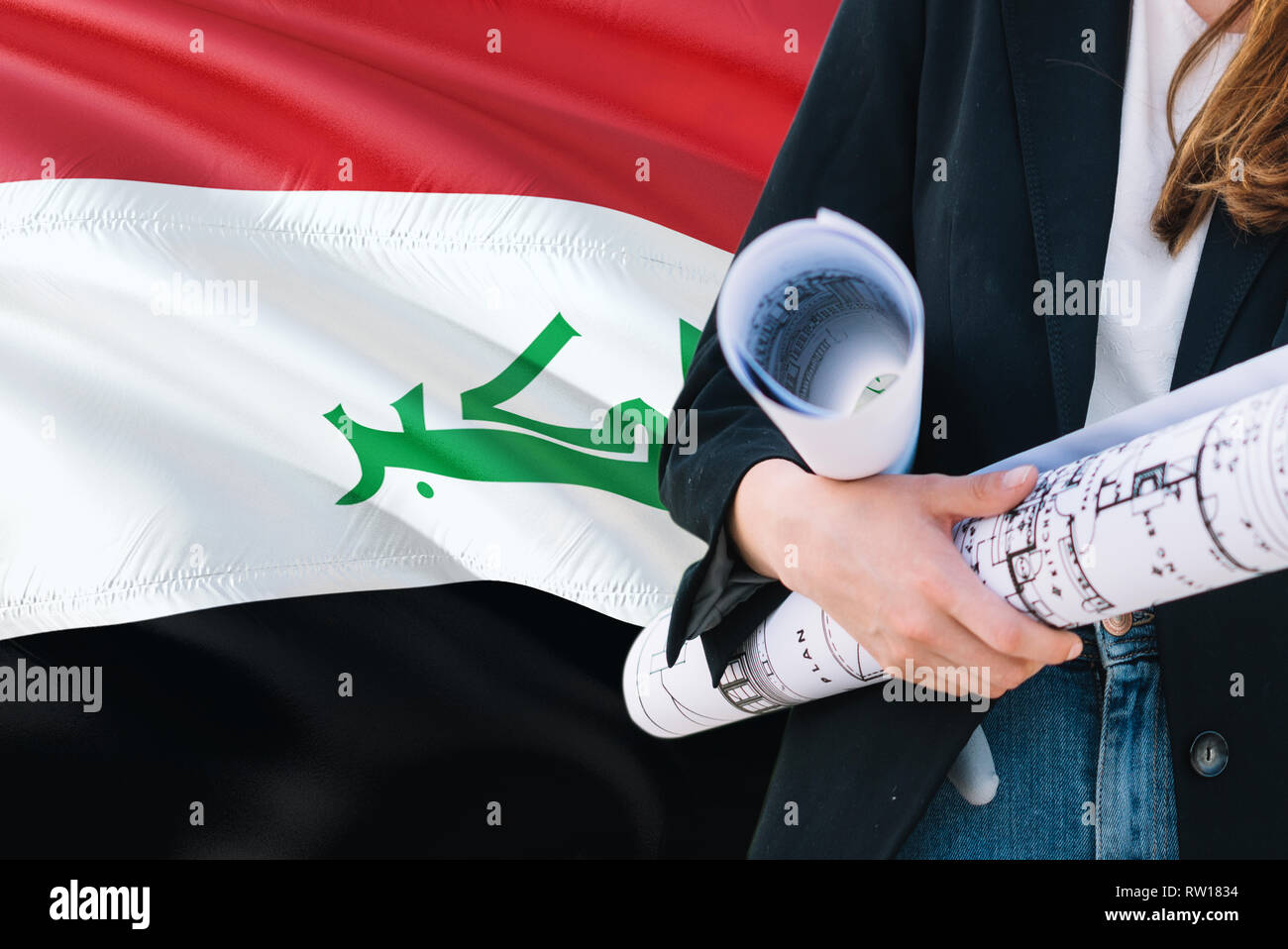 Iraqi Architect woman holding blueprint against Iraq waving flag ...