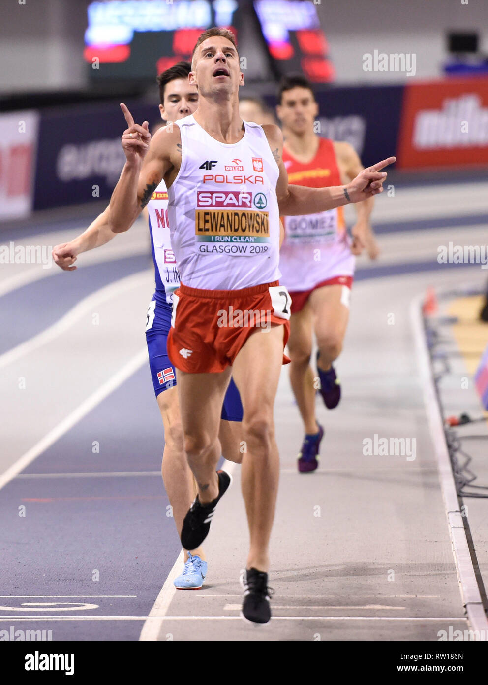 Poland's Marcin Lewandowski crosses the finish line to win the Men's ...