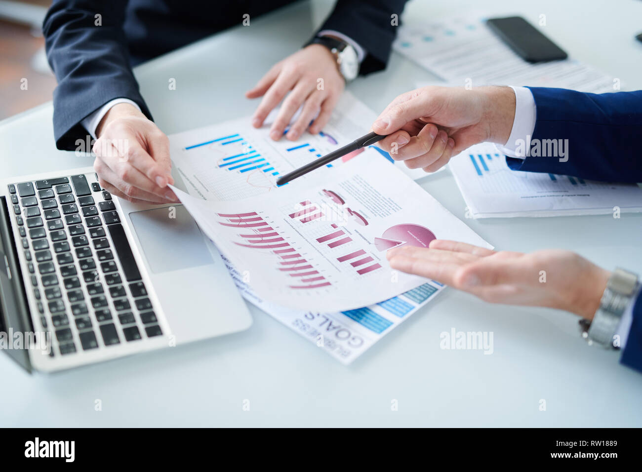 Corporate colleague laptop chart hi-res stock photography and images ...