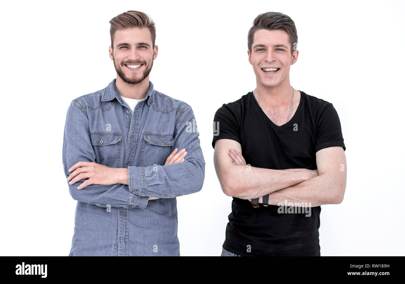 A full-length shot of two friends standing Stock Photo - Alamy