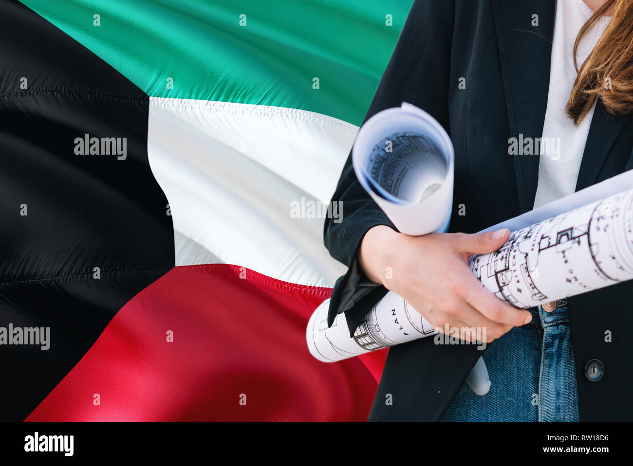 Kuwaiti Architect woman holding blueprint against Kuwait waving flag ...