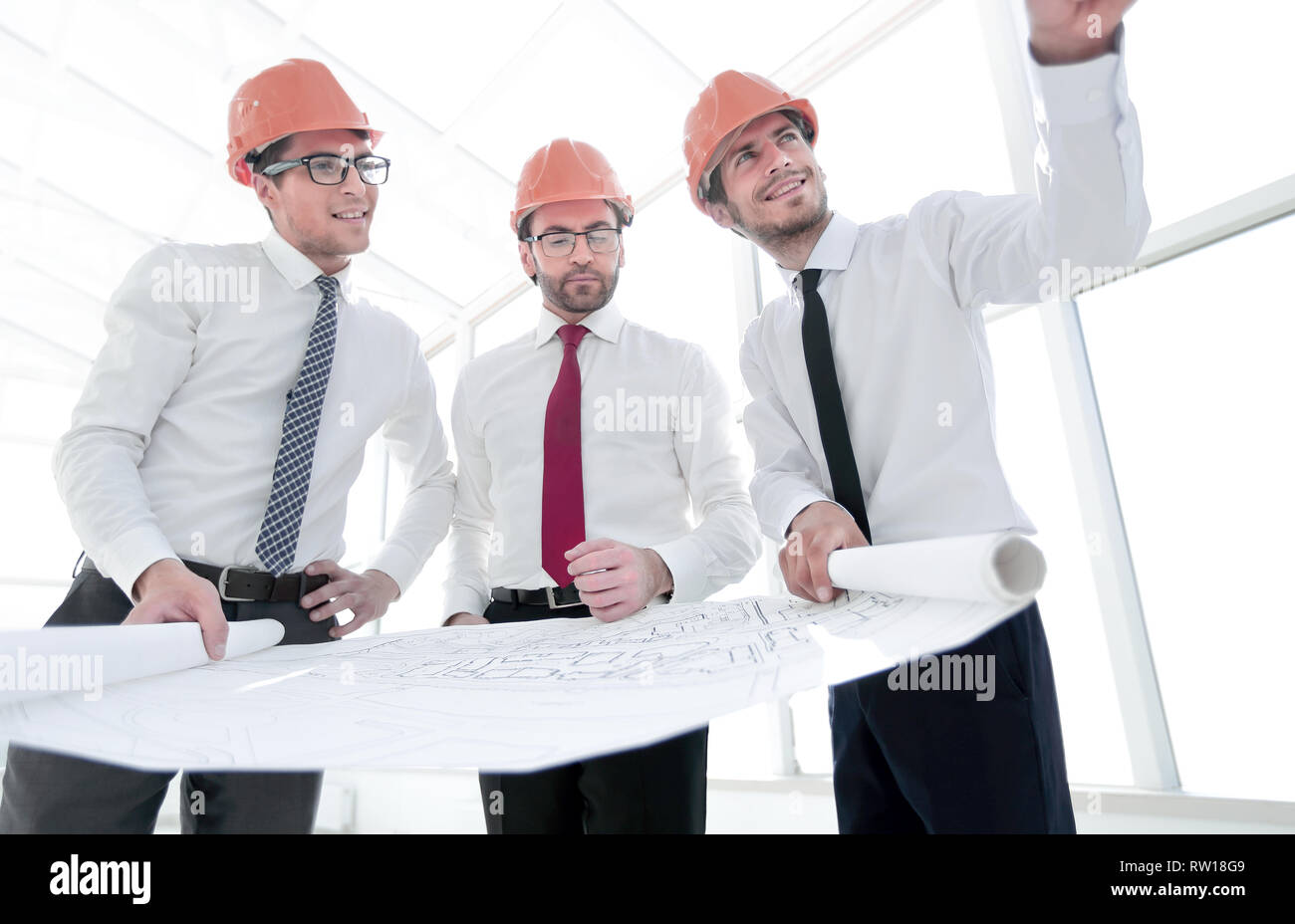 group of designers of builders working with a new projec Stock Photo ...