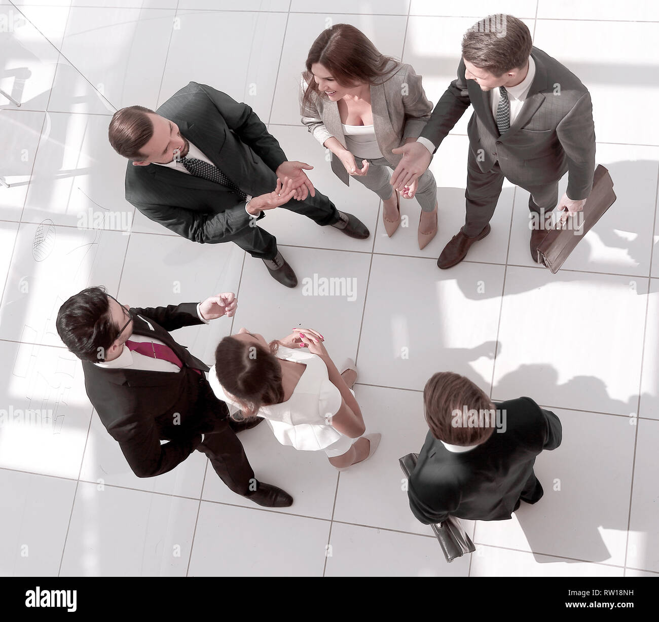 top view. employees discussing important issue Stock Photo - Alamy