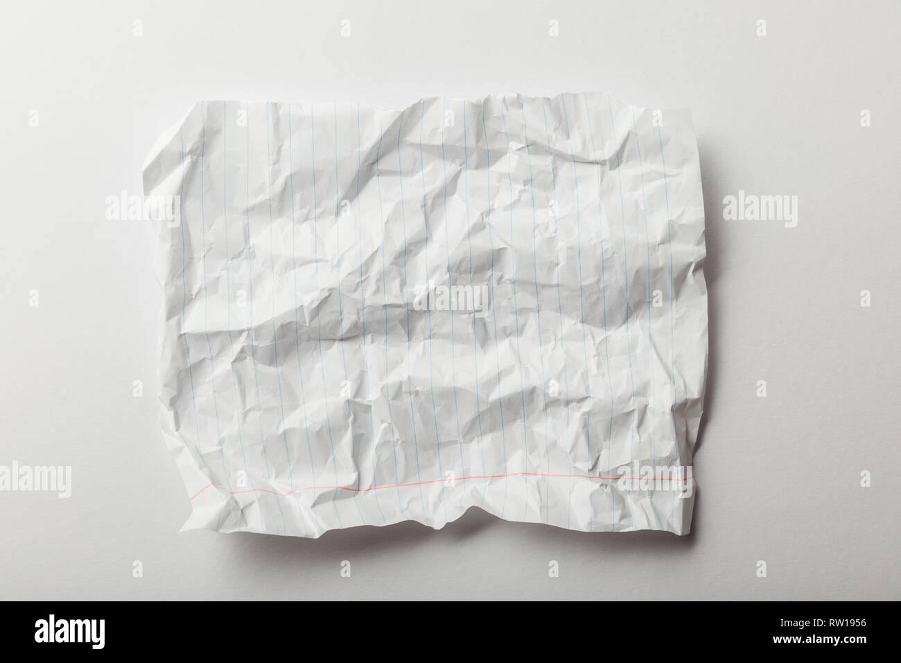 top view of white lined crumpled page on white background Stock Photo ...