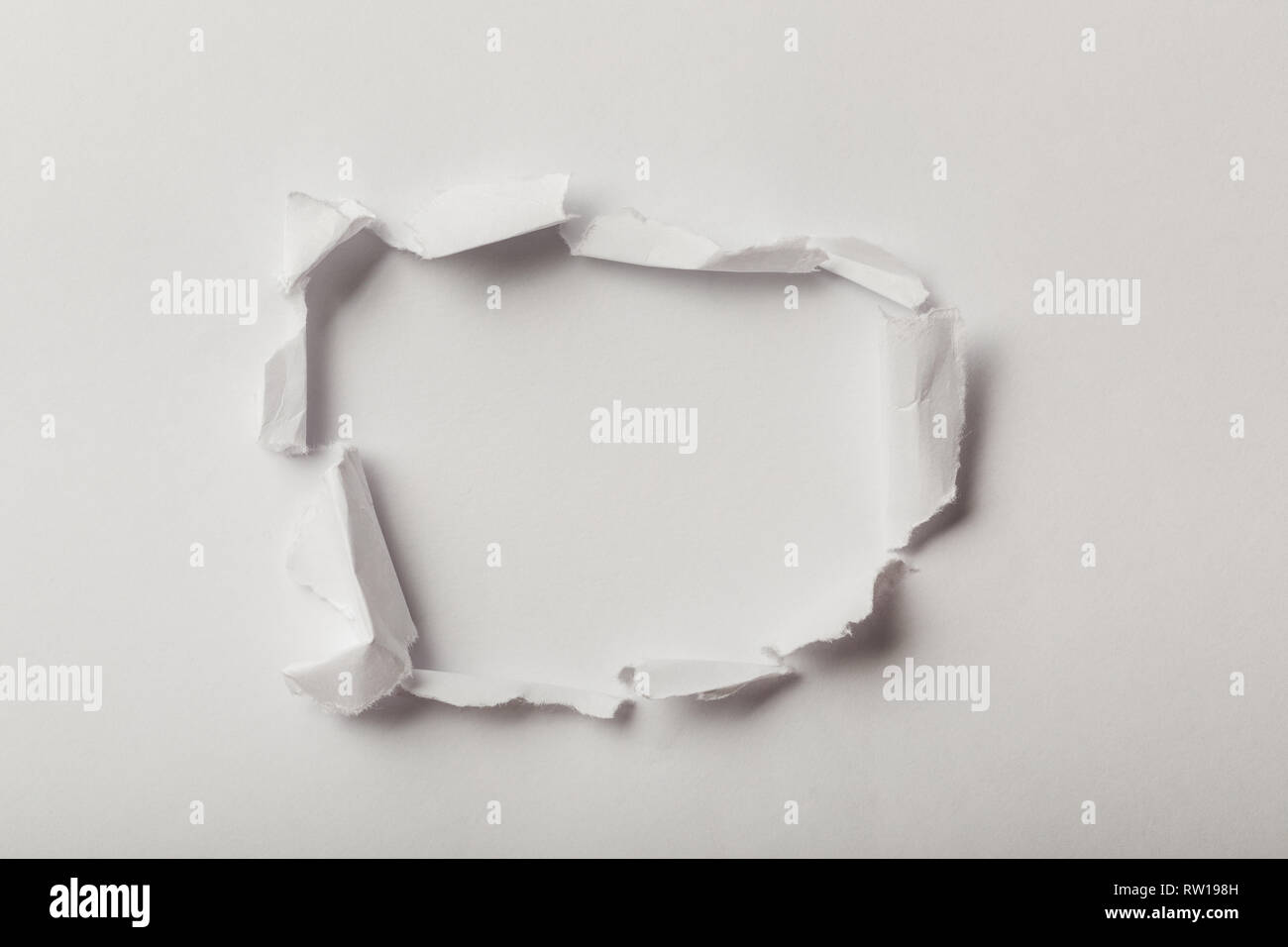 top view of ripped sheets of paper on white background Stock Photo - Alamy