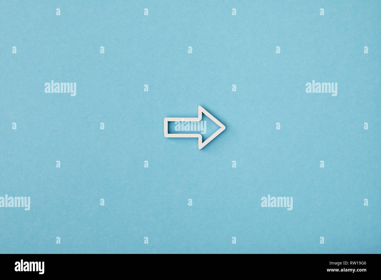 top view of white horizontal frame pointer on blue background Stock ...