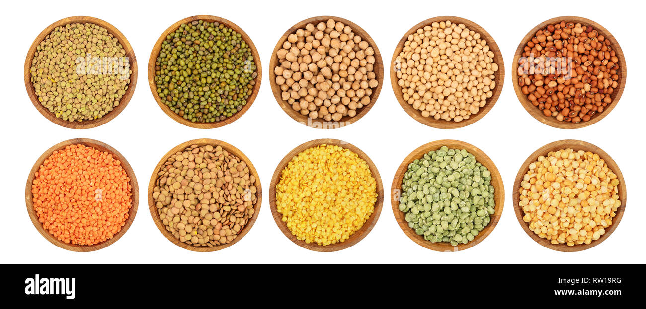 mix legumes in wooden bowl isolated on white background Stock Photo - Alamy