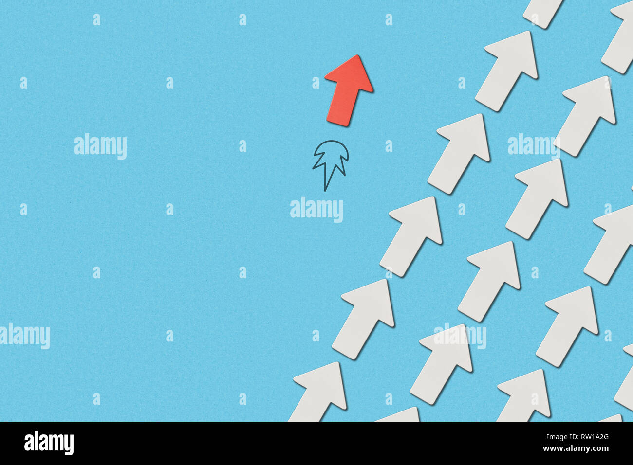 top view of red arrow and diagonal rows with white pointers on blue ...